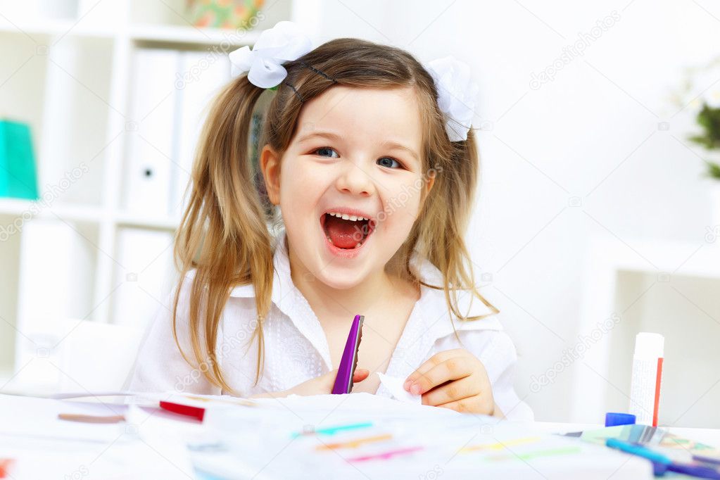 Little girl studying Stock Photo by ©SergeyNivens 11348106
