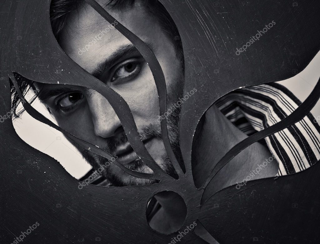 Shaped portrait of a beautiful man. — Stock Photo © innervision #11076097