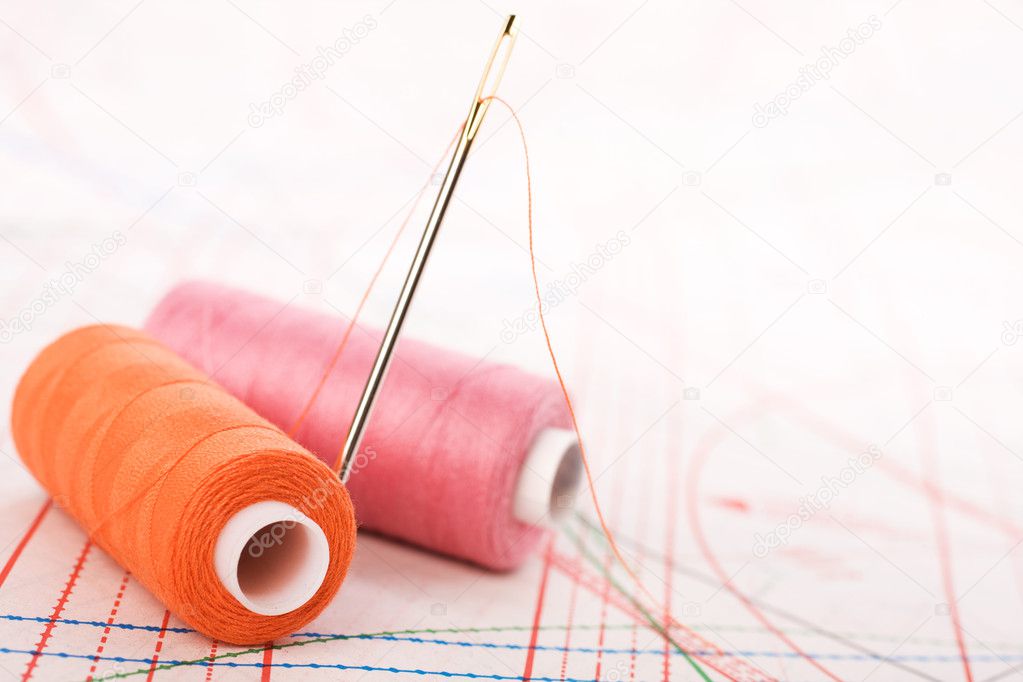 Spool of thread and needle. Sew accessories. Stock Photo by ©natika ...