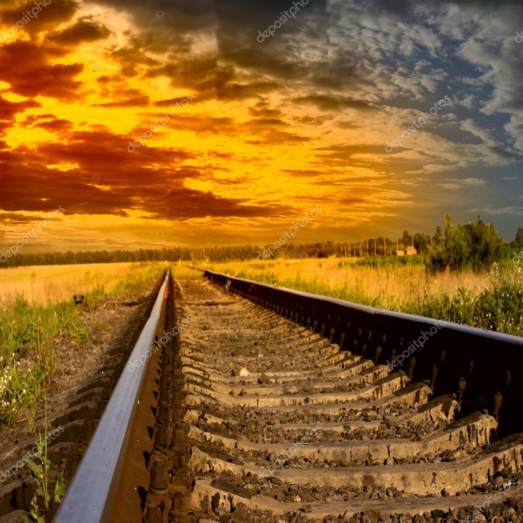 Railway into the sunset Stock Photo by ©osalenko 12306206