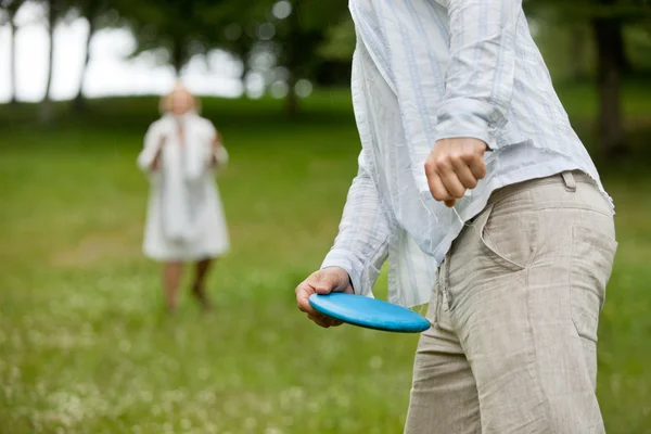 Man Holding Flying Disc - Stock Image - Everypixel
