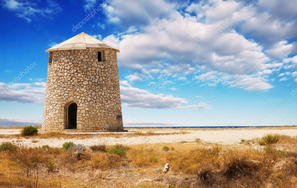 Old windmill ai Gyra beach, Lefkada — Stock Photo © anatema #12001406