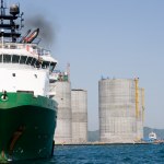 Tugs towing base offshore oil platform Stock Photo by ©Stas_K 11317504