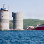 Tugs towing base offshore oil platform Stock Photo by ©Stas_K 11317504