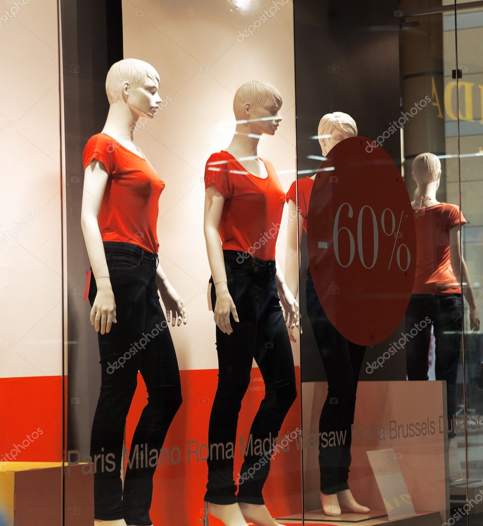 Dressed dummies in a show-window of modern fashion shop – Stock ...