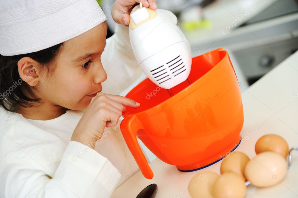 Little kid boy is cooking Stock Photo by ©ZouZou 11751474