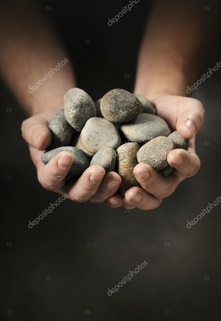 Hands full of rocks Stock Photo by ©stocksnapper 10914997
