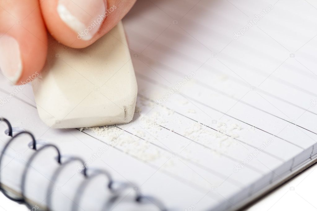 Erasing Text on Notepad Stock Photo by ©DWiedemann 12002290
