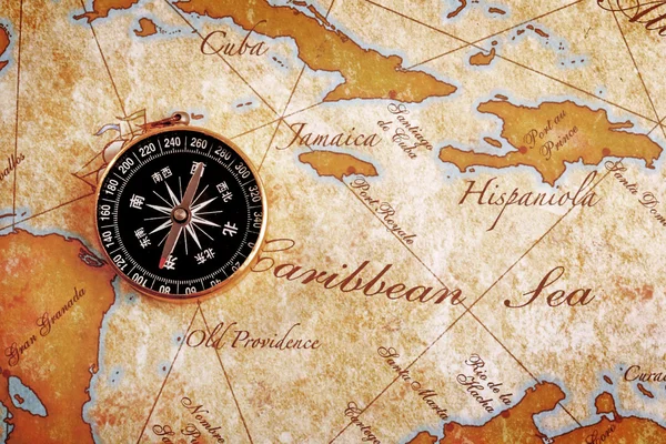 Compass on a Treasure map Stock Photo by ©zhudifeng 10810031