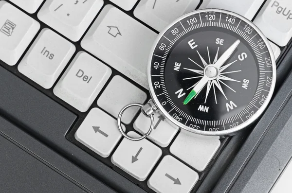 Computer keyboard and retro compass — Stock Photo © merznatalia #15793201