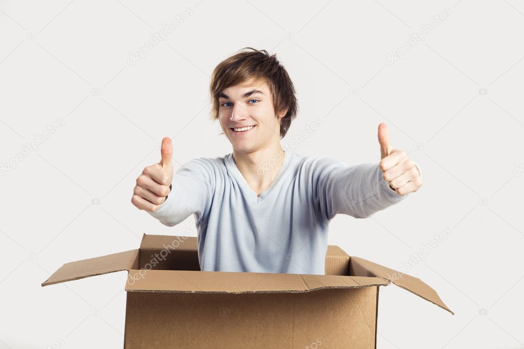 Man inside a card box Stock Photo by ©ikostudio 11787066