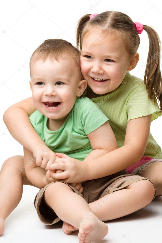 Two children are having fun while sitting on floor — Stock Photo ...