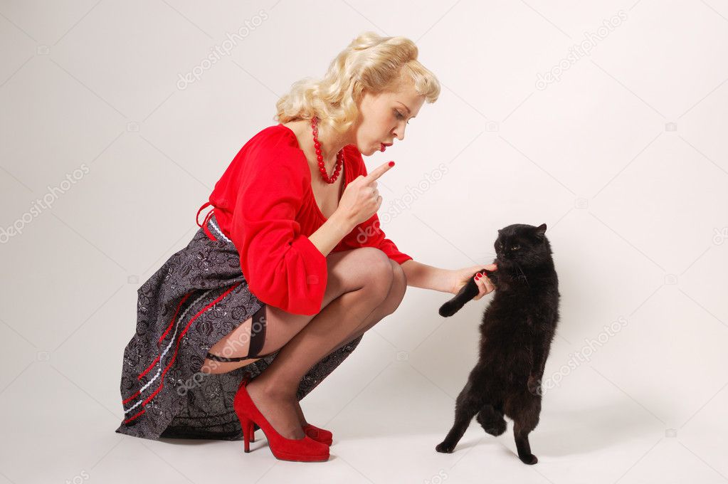 Pin-up girl with black cat Stock Photo by ©khorzhevska 12113261