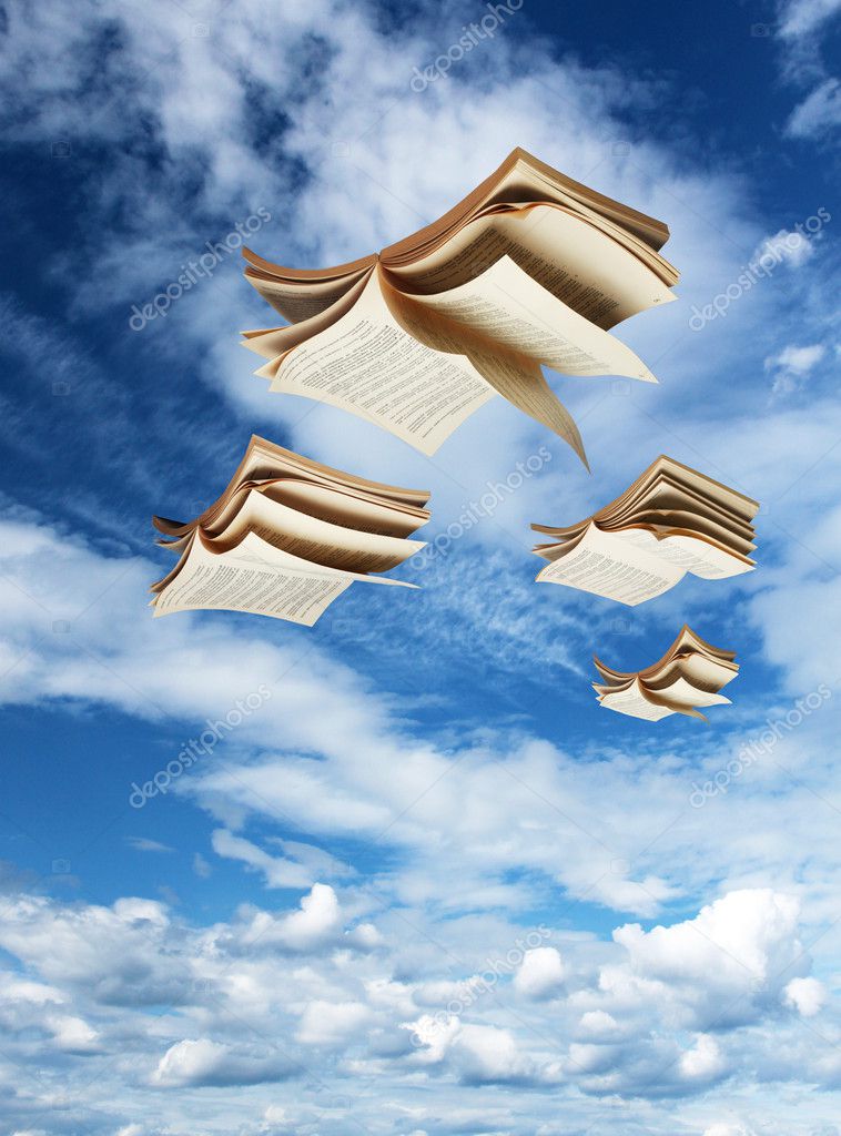 Four open books flying above Stock Photo by ©anterovium 11897222