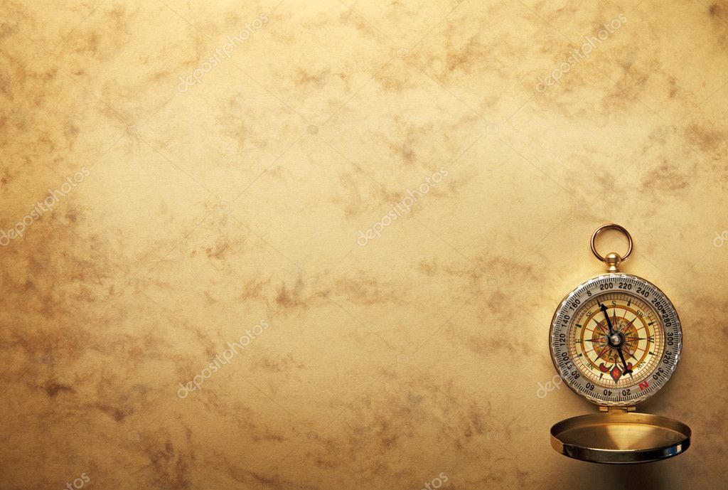 Compass on the old paper background Stock Photo by ©tribal 11010846