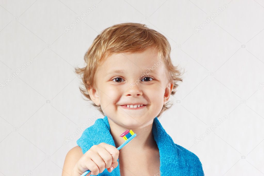 Young cute blond boy with toothbrush with pink toothpaste — Stock Photo ...