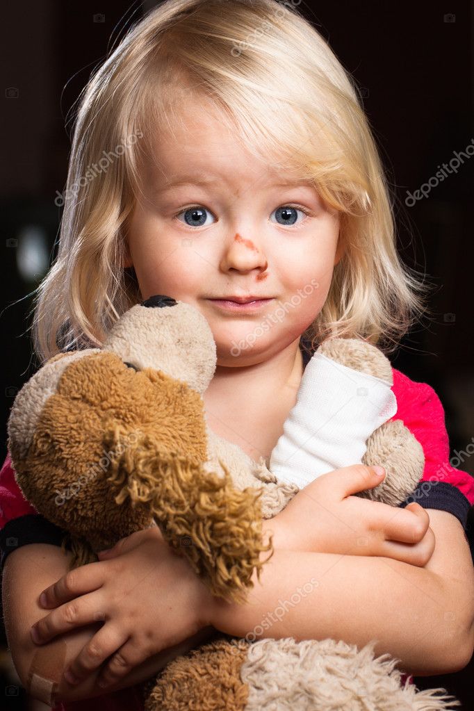 Sad injured little boy — Stock Photo © Jaykayl #11680292