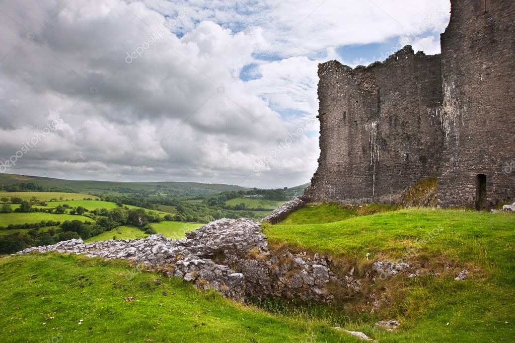 Ruined medieval castle landscape with dramatic sky Stock Photo by ...