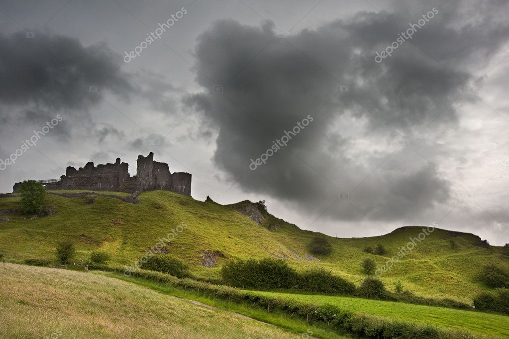 Ruined medieval castle landscape with dramatic sky Stock Photo by ...