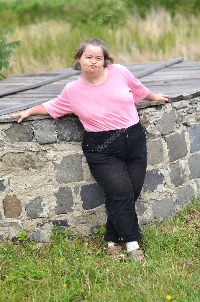 Woman with down syndrome Stock Photo by ©muro 11878699