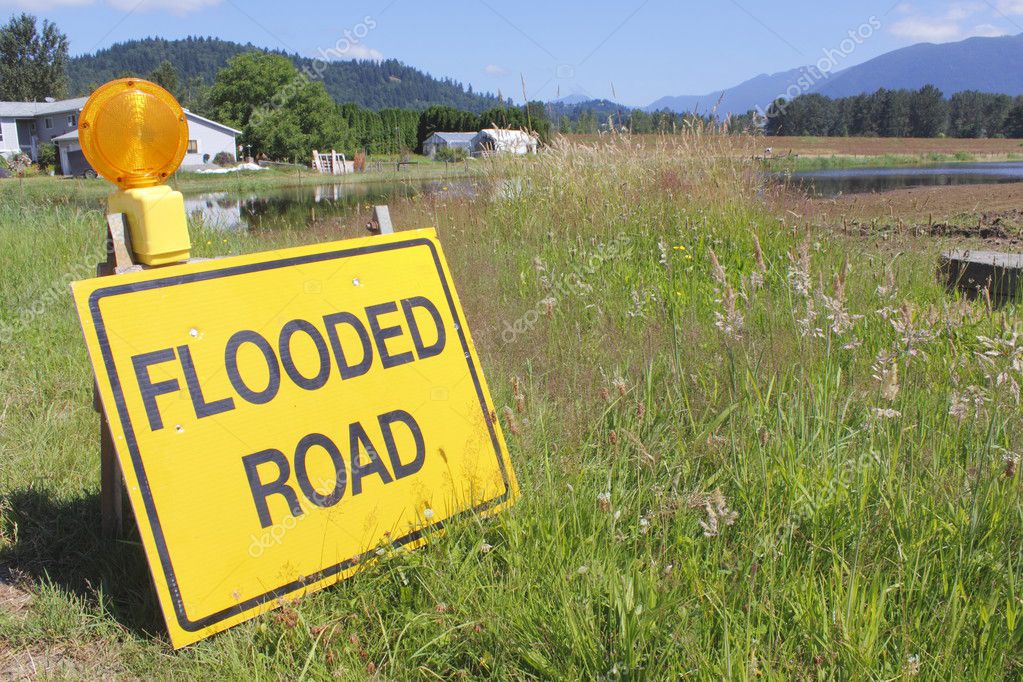 Flooded Road Sign Stock Photo by ©modfos 11750194