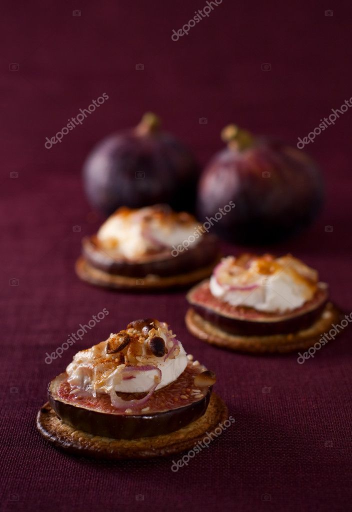 Figs and cheese on cracker Stock Photo by ©sarsmis 12273156