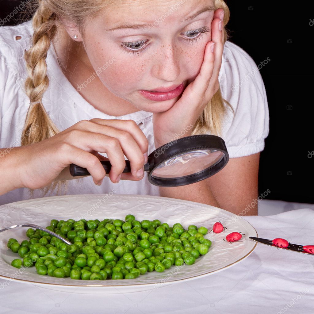 Girl examining bugs on table with magnifying glass Stock Photo by ...
