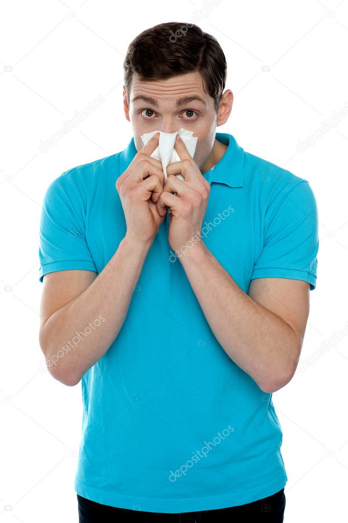 Young guy suffering from cold — Stock Photo © stockyimages #11782332