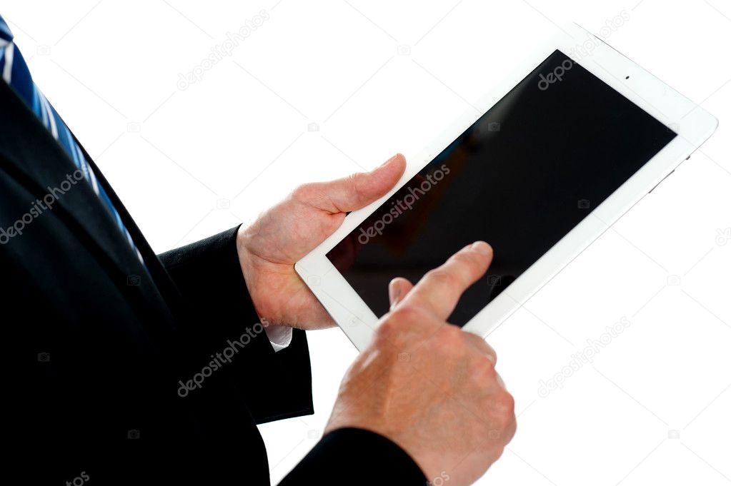 Man operating touch screen device, focus on tablet Stock Photo by ...