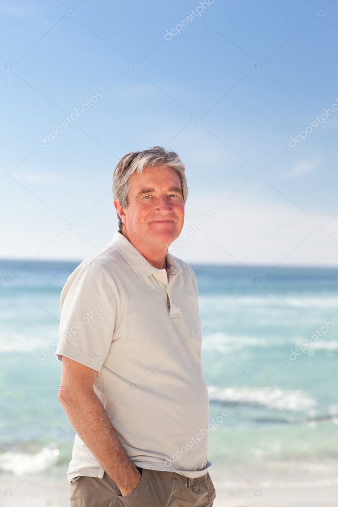Pensif man on the beach — Stock Photo © Wavebreakmedia #10854513