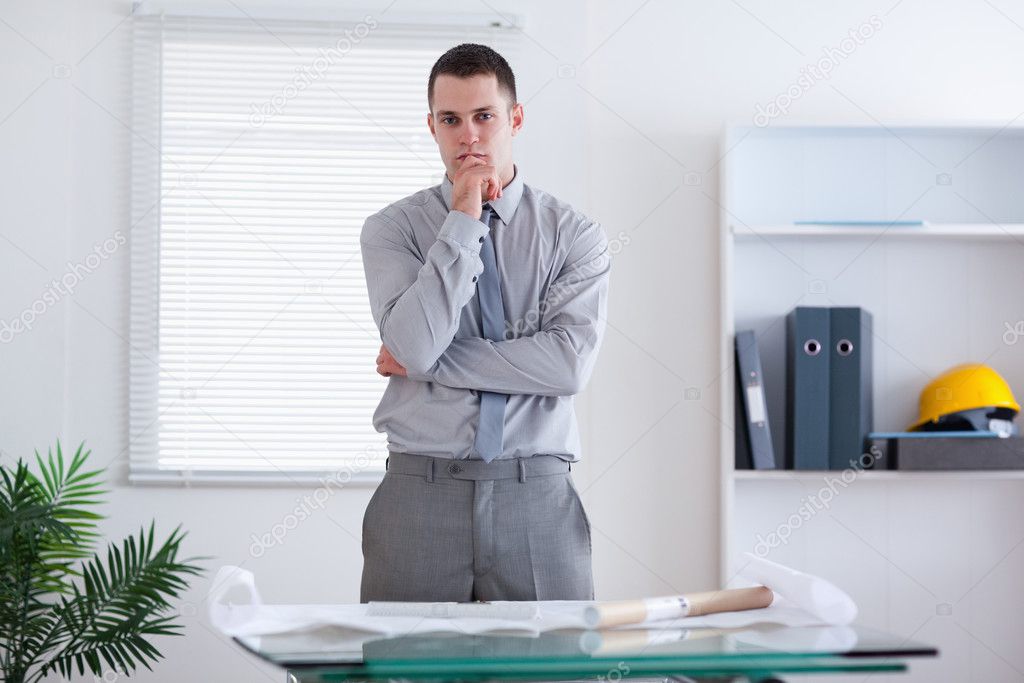 Businessman standing and thinking — Stock Photo © Wavebreakmedia #11194614