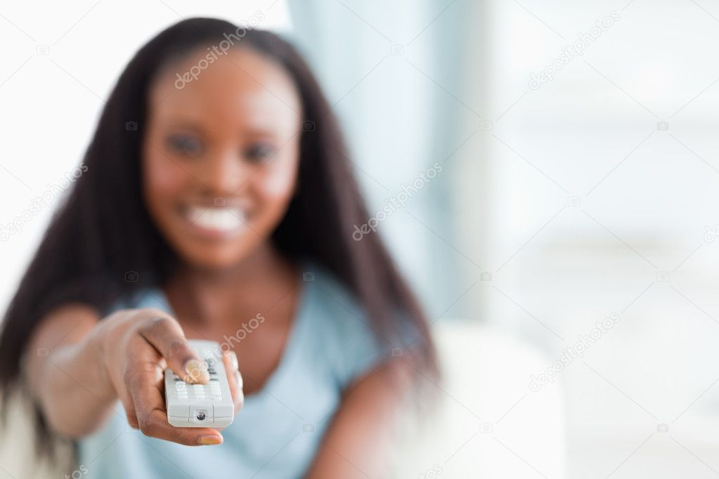 Close up of remote control being used by woman — Stock Photo ...