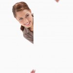 Woman looking at blank sign Stock Photo by ©Wavebreakmedia 11214241