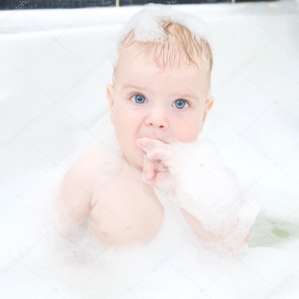 Cute baby boy is washing Stock Photo by ©Vitalinka 10751713
