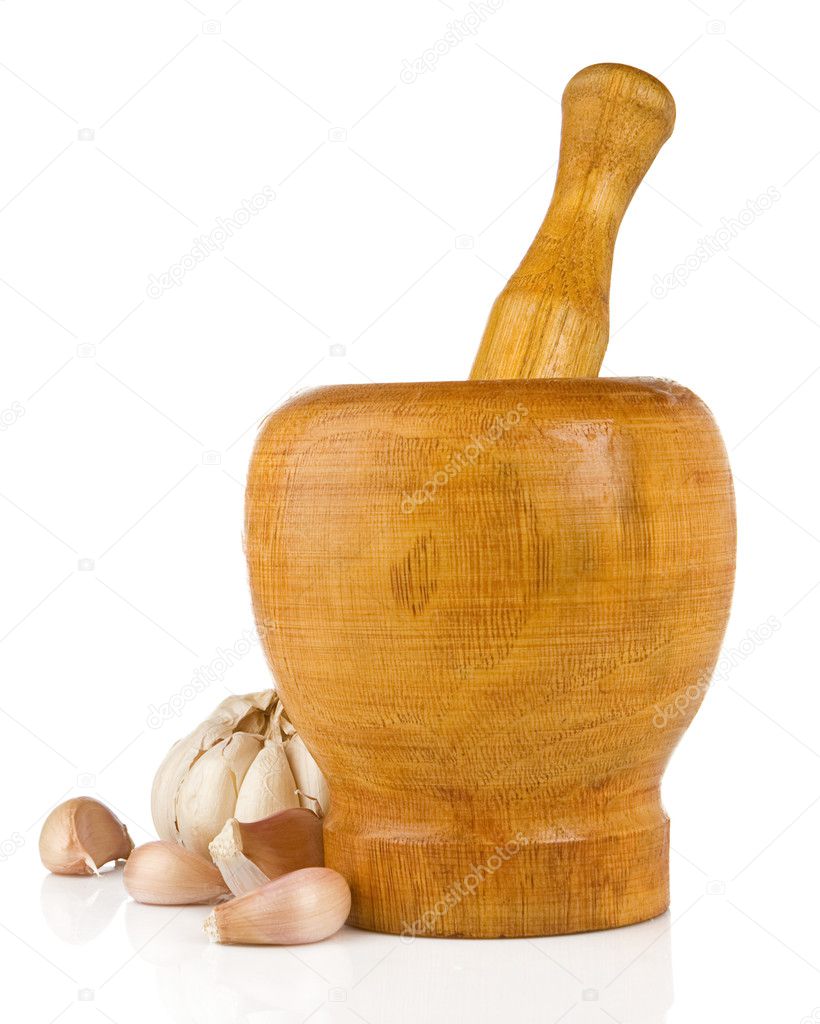 Garlic in mortar and pestle isolated on white — Stock Photo © seregam ...