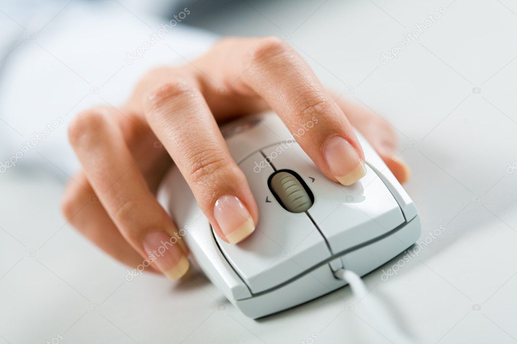 Hand on mouse Stock Photo by ©pressmaster 11125162
