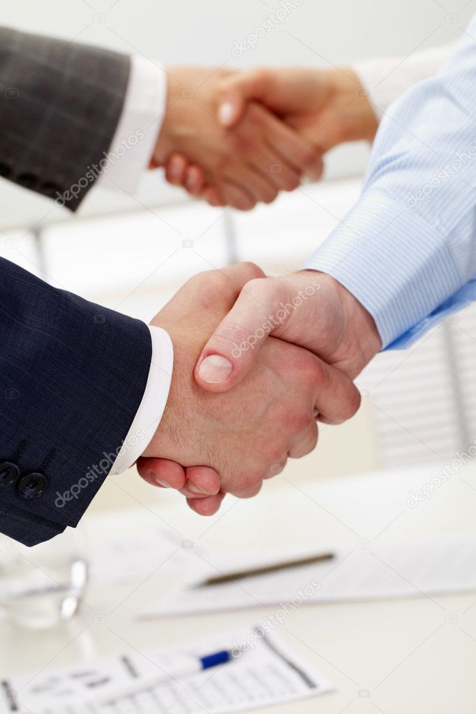 Pair of handshakes — Stock Photo © pressmaster #11631382