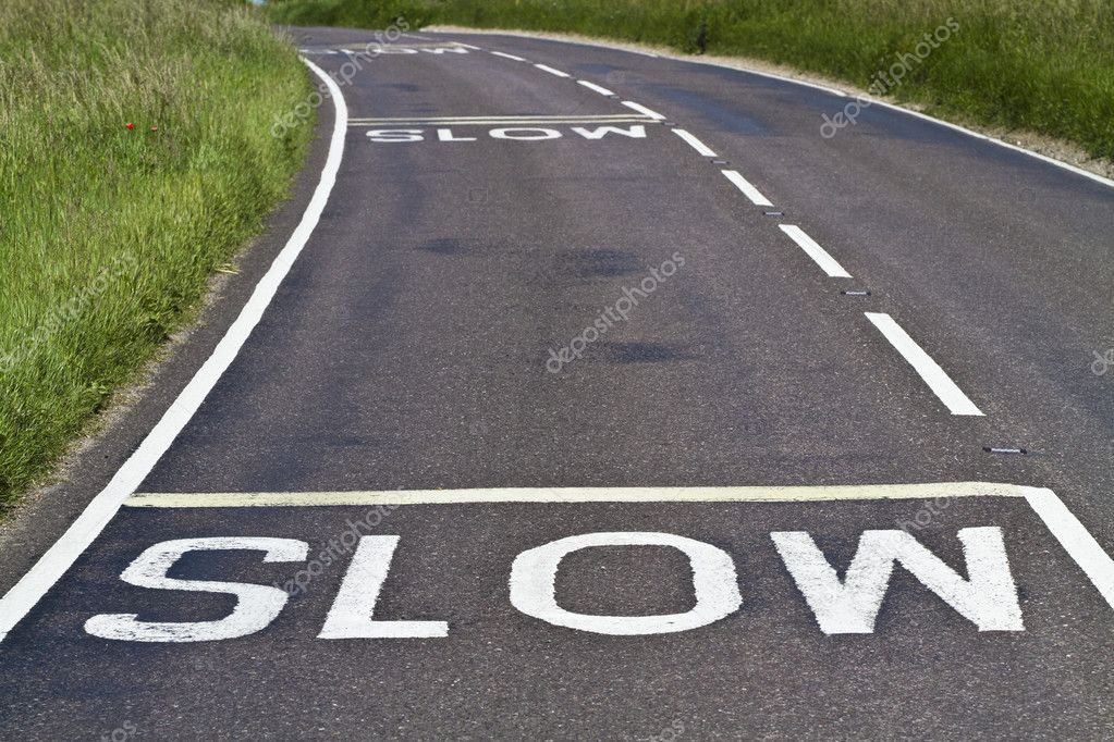 Slow signs on the road Stock Photo by ©Chrispo 11290715