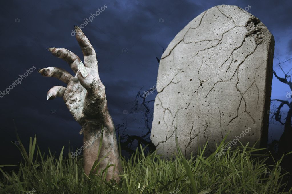 Zombie hand coming out of the ground — Stock Photo © fergregory #11458824