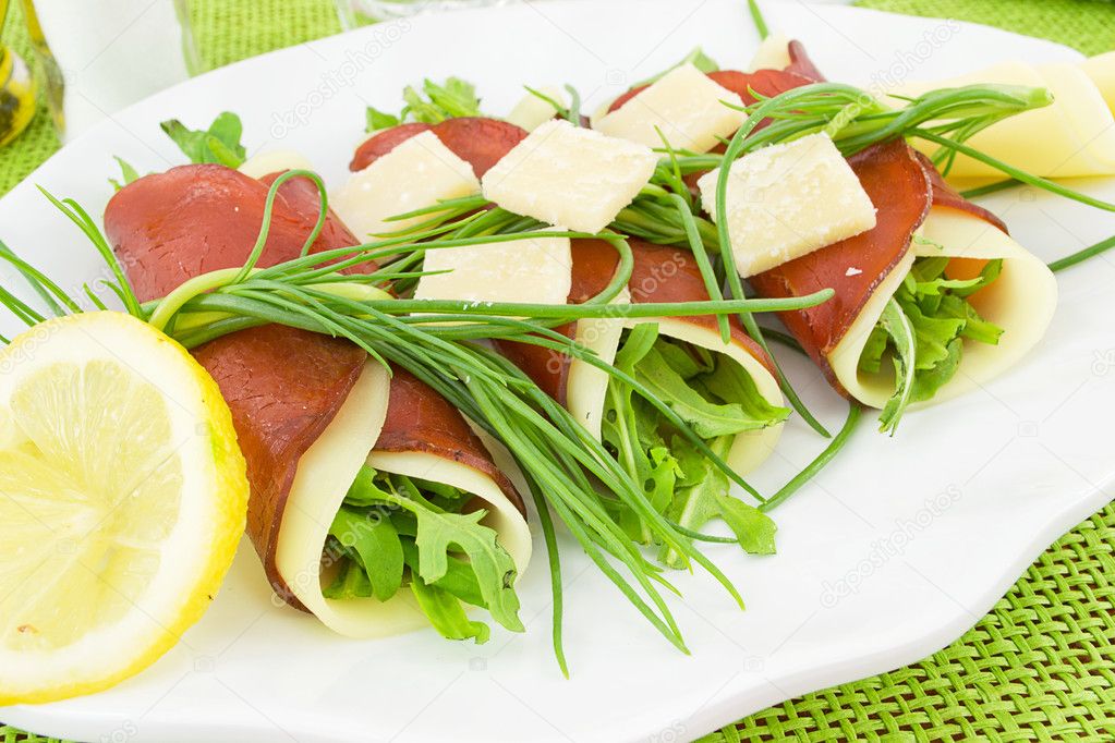Rolls of bresaola, arugula and Parmesan Stock Photo by ©ppi09 11707279