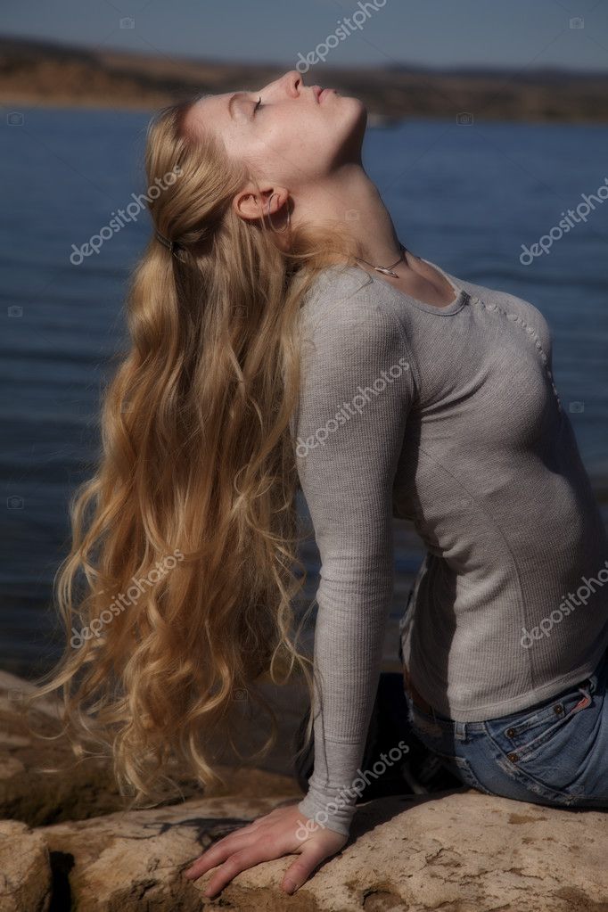 Woman head back by water — Stock Photo © alanpoulson #11949326